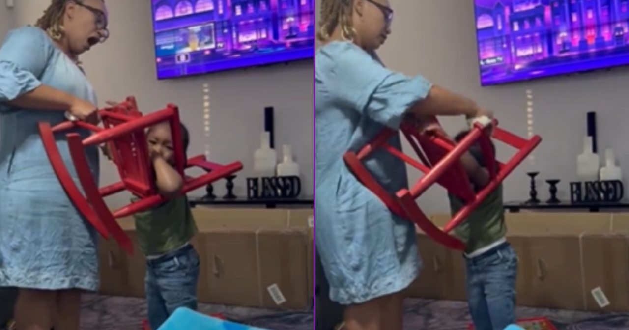 Family Work To Remove Boy From Wooden Chair